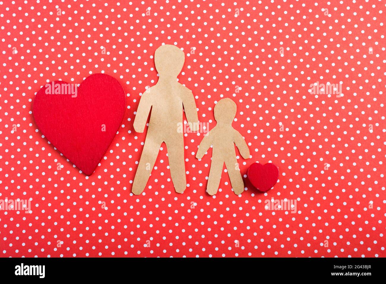 Paper man shapeand hearts in the view Stock Photo - Alamy