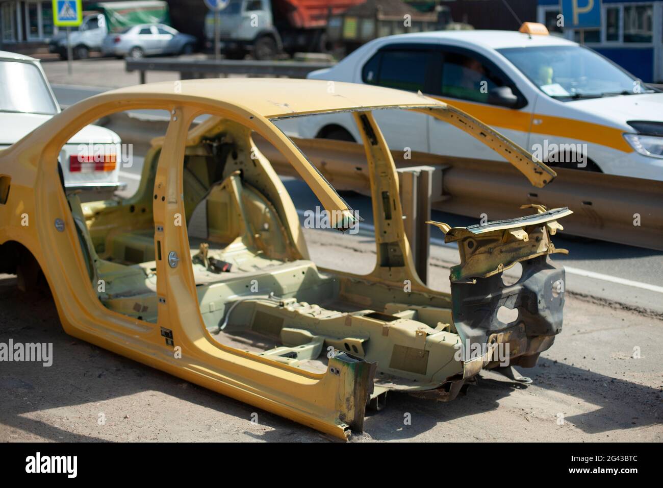 Disassembled car frame on the street. Car after an accident. Unsuitable ...