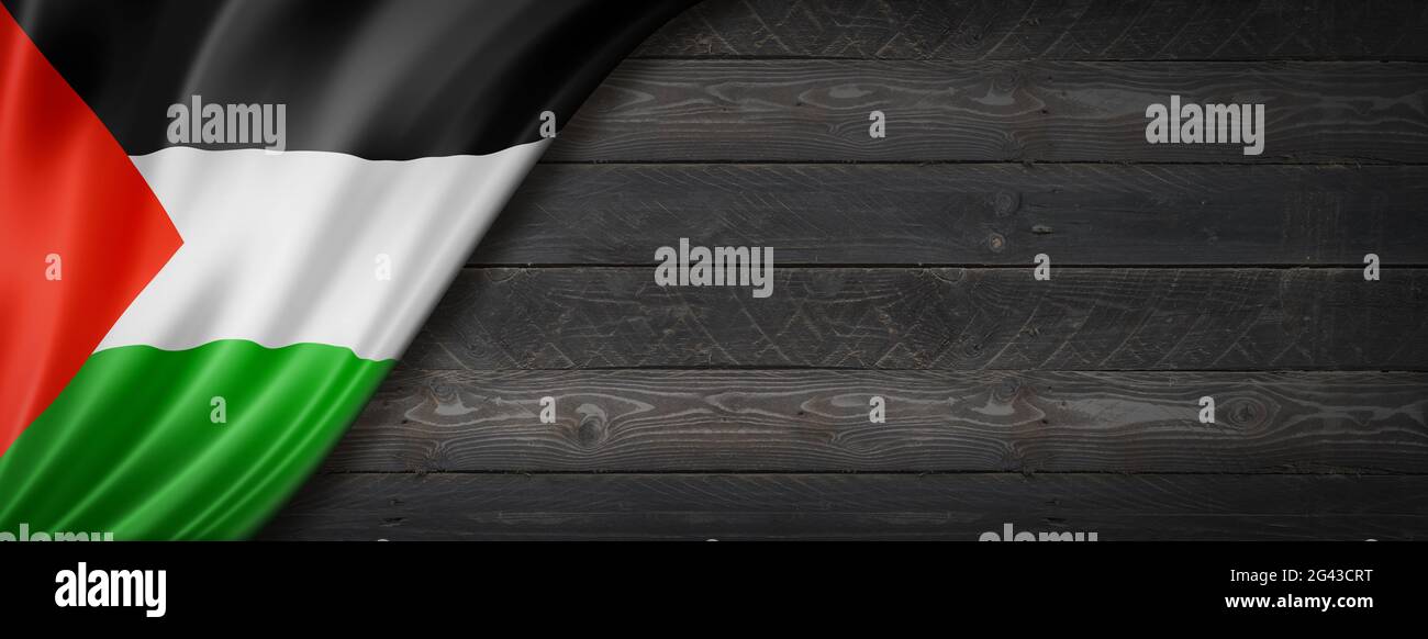 Palestinian flag on black wood wall banner Stock Photo - Alamy