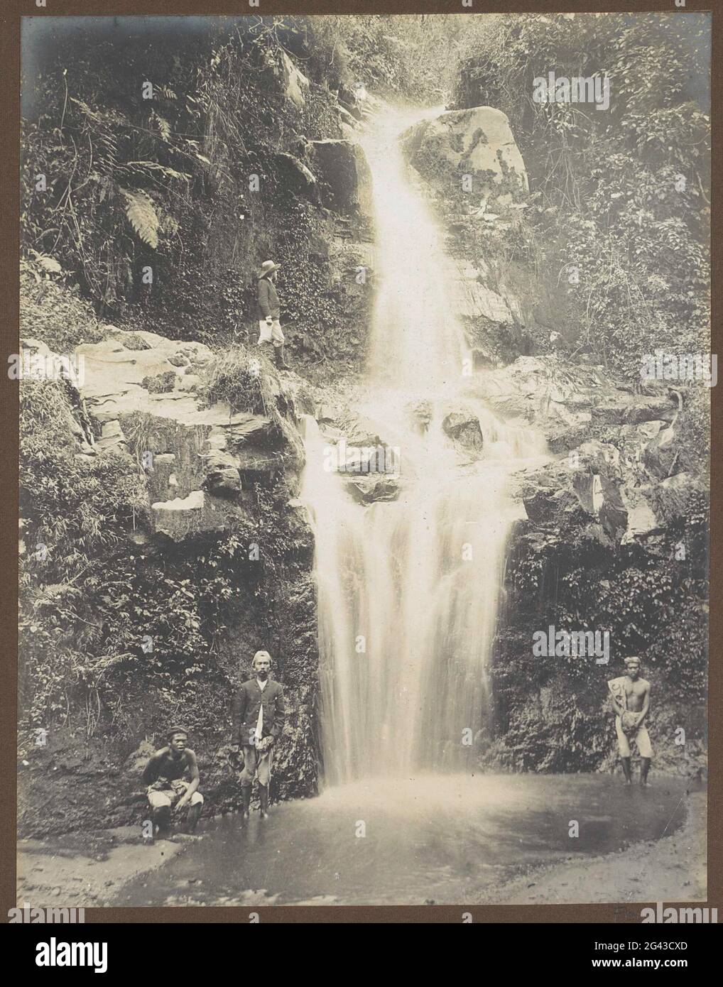 Three Indian people and (presumably) a Dutchman at a waterfall in the ...