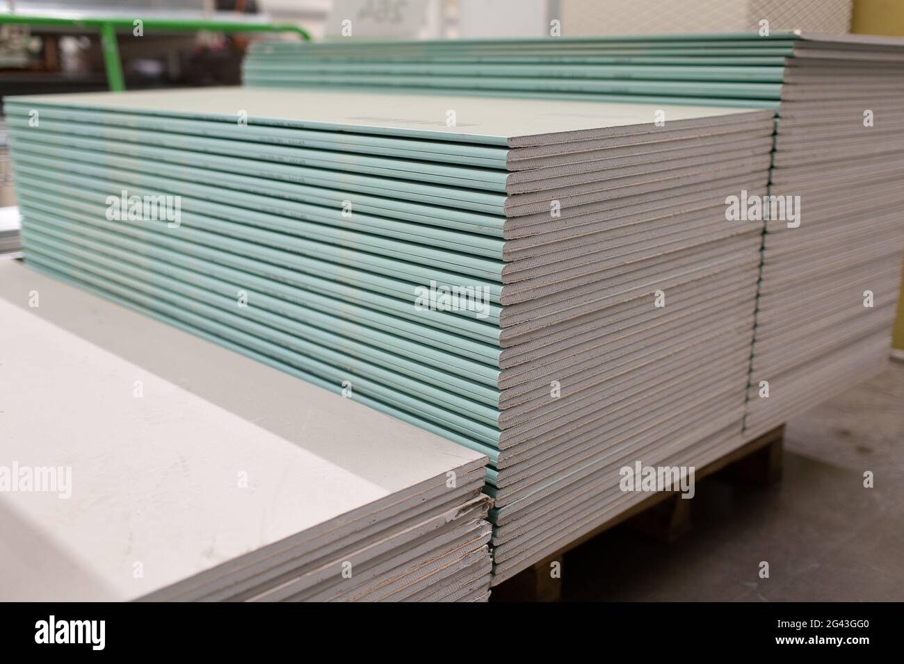 Pallet with Drywall sheets plasterboard in the building warehouse store ...