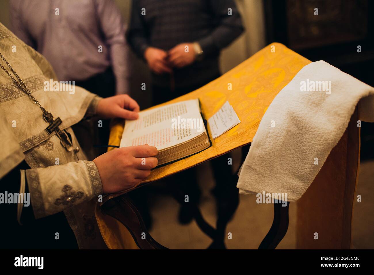 Orthodox Christian Priest and Holy Bible in the church. Epiphany ...