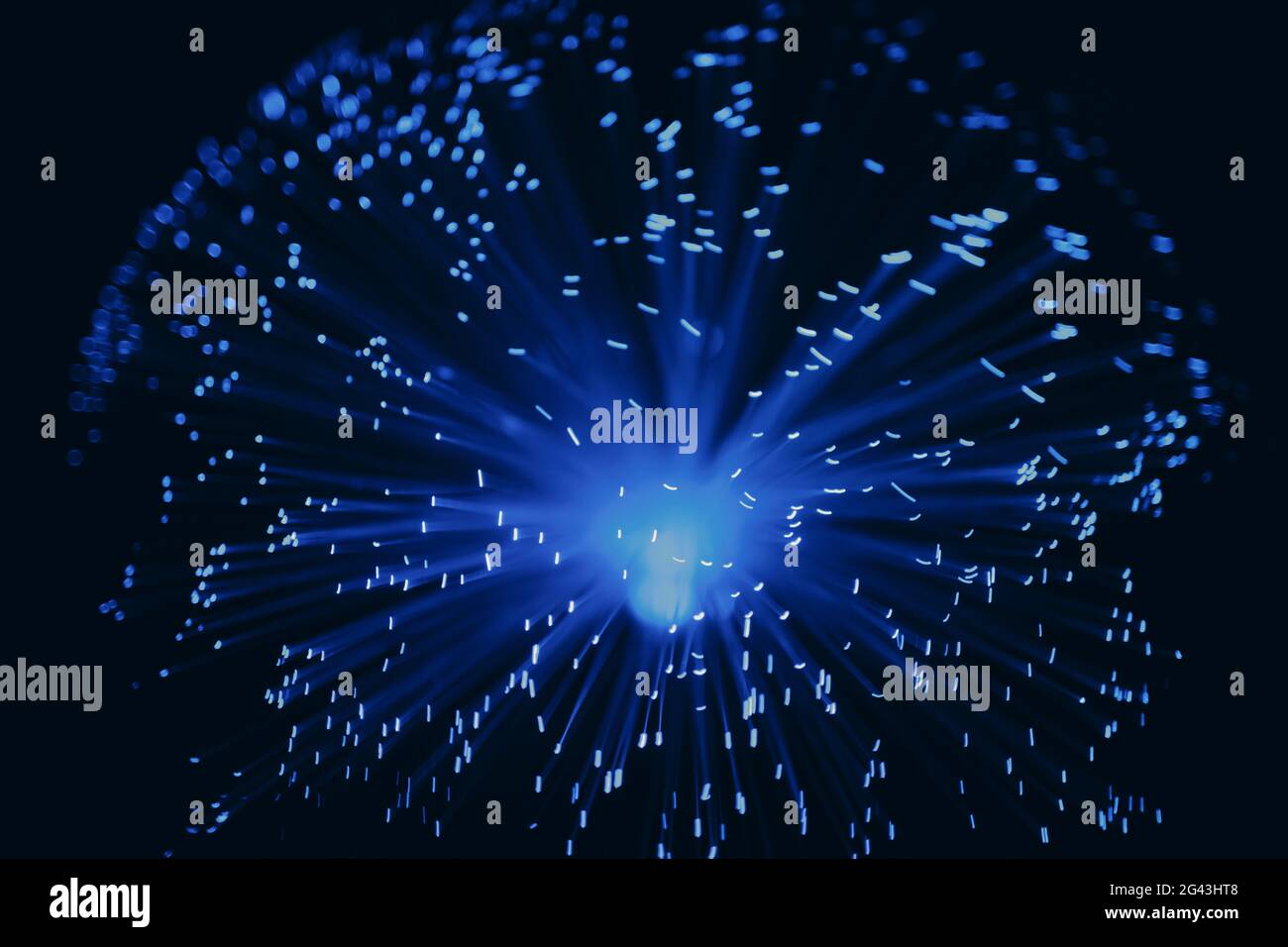 Blue abstract particles and lines with bokeh and blur in dark ...