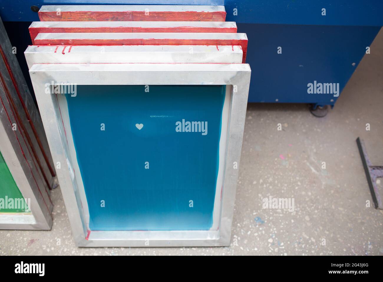 Silk screen printing. Serigraphy. Color paints and fabric Stock Photo ...