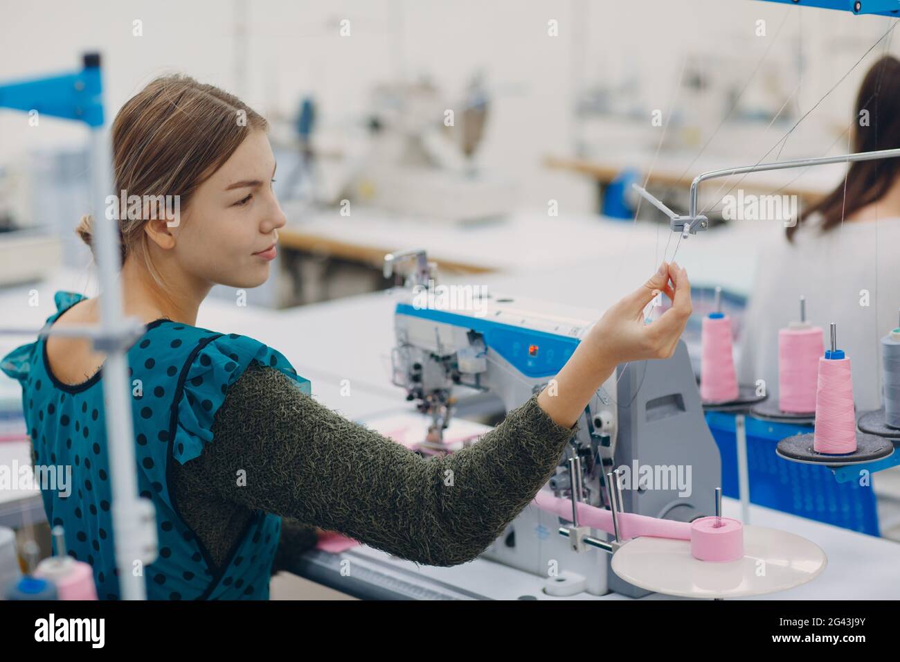 Sewing machine factory hi-res stock photography and images - Alamy