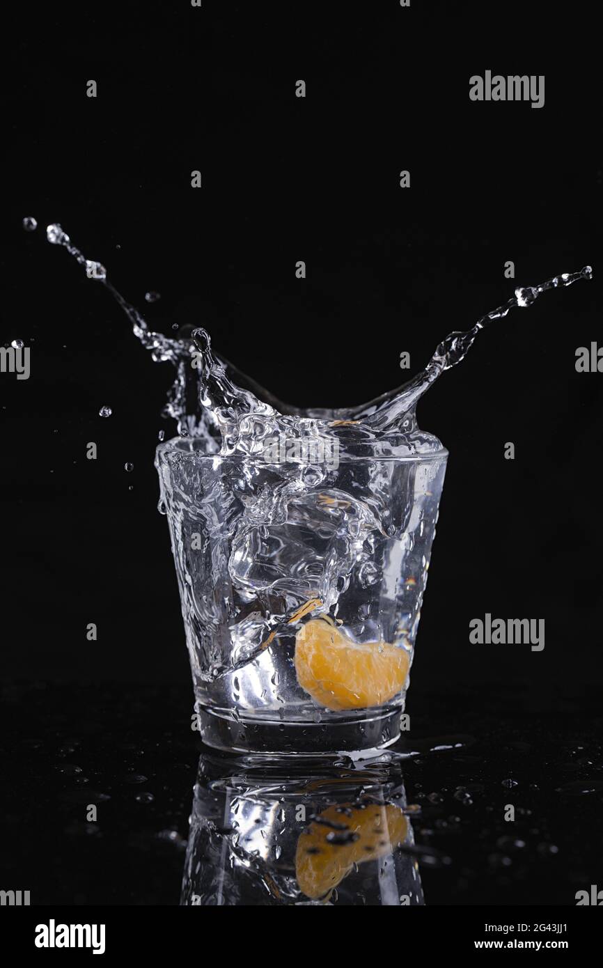 Ice drop with water splash hi-res stock photography and images - Alamy