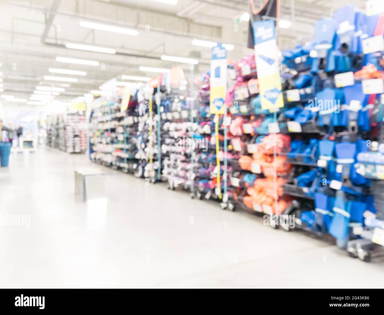 Blurred sport and travel hypermarket aisle Stock Photo - Alamy