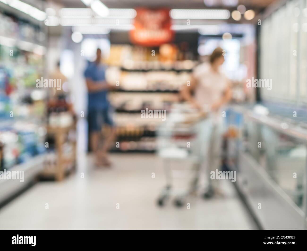 Blurred supermarket aisle Stock Photo - Alamy