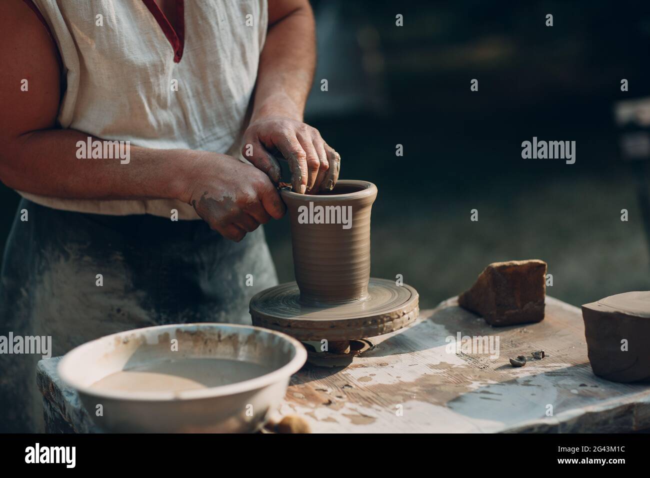 Potter molding clay pot hi-res stock photography and images - Alamy