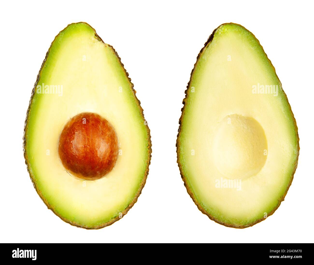 Cut in half avocado on a white background. Isolated Stock Photo - Alamy