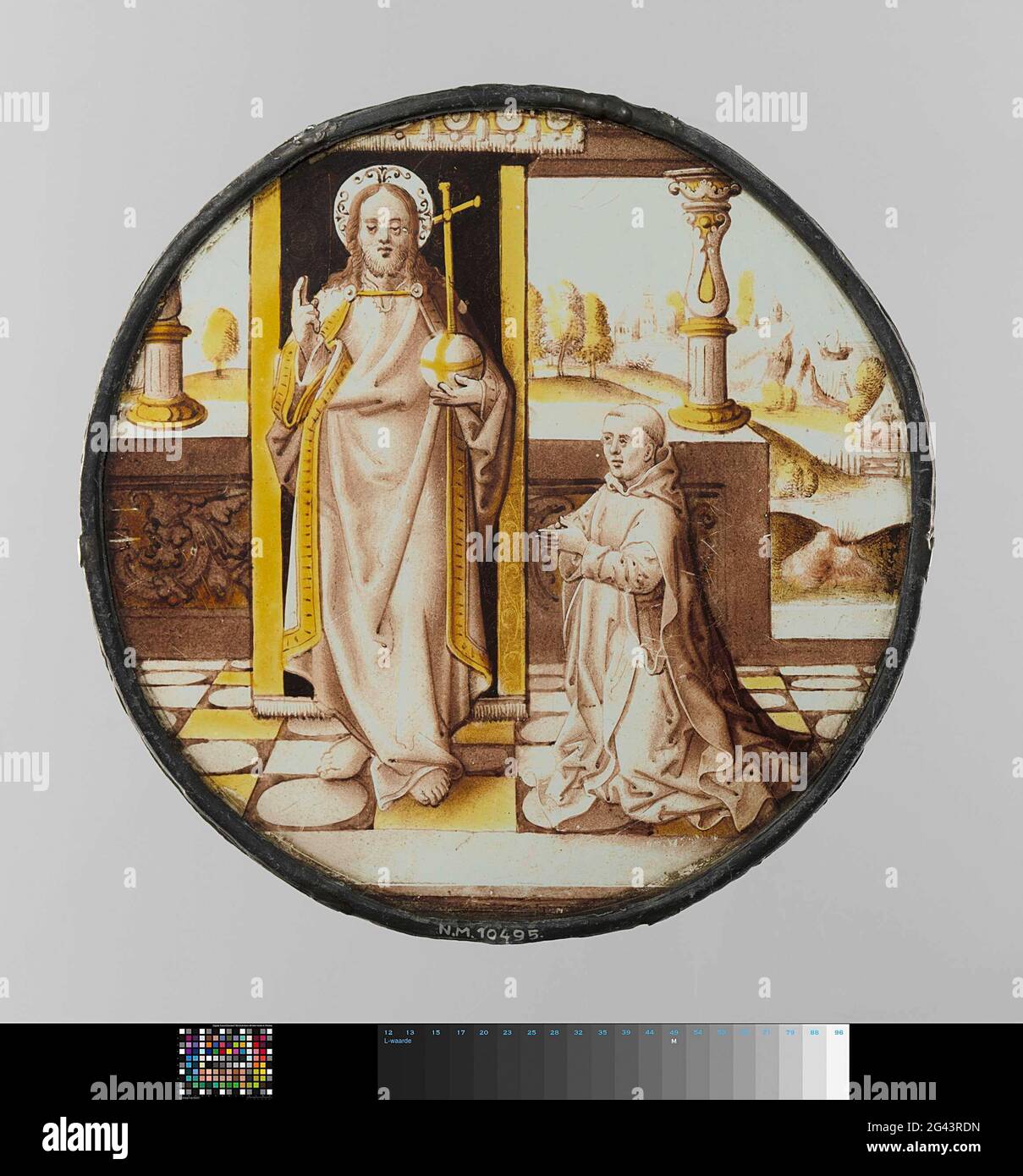 Square with kneeling monk BC. A round stained glass diamond with the ...