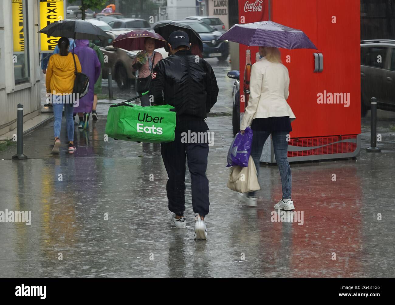 Bucharest, Romania - June 18, 2021: An Uber Eats food delivery courier ...