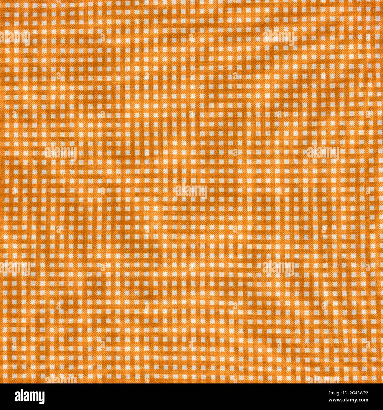 Orange checkered tablecloth background texture Stock Photo - Alamy