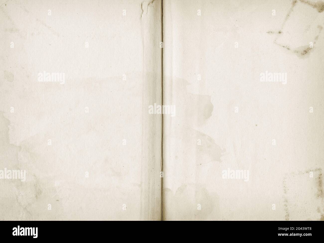 Old stained open book. Background texture Stock Photo - Alamy