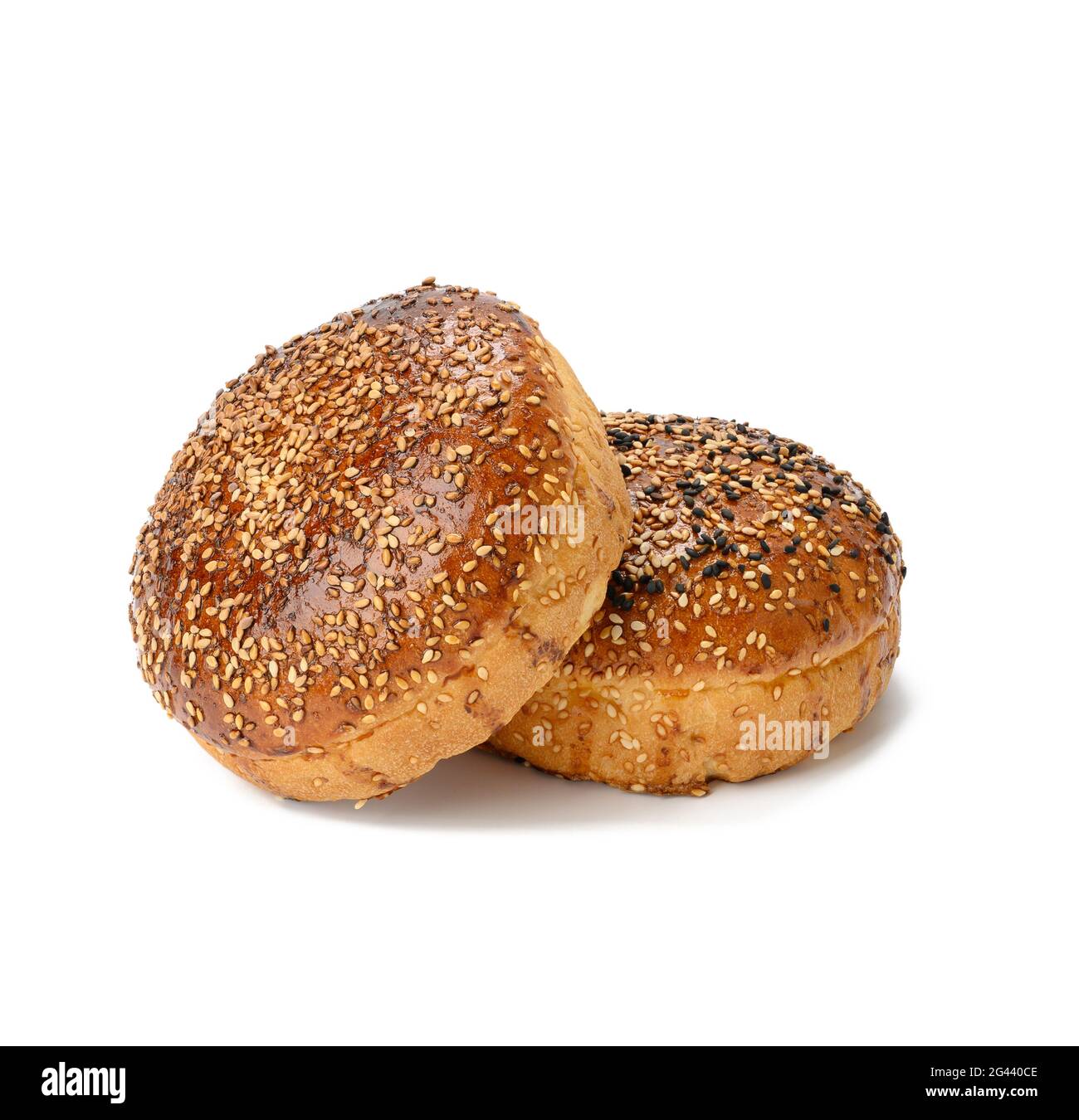 Two baked sesame seed buns isolated on white background, hamburger ...