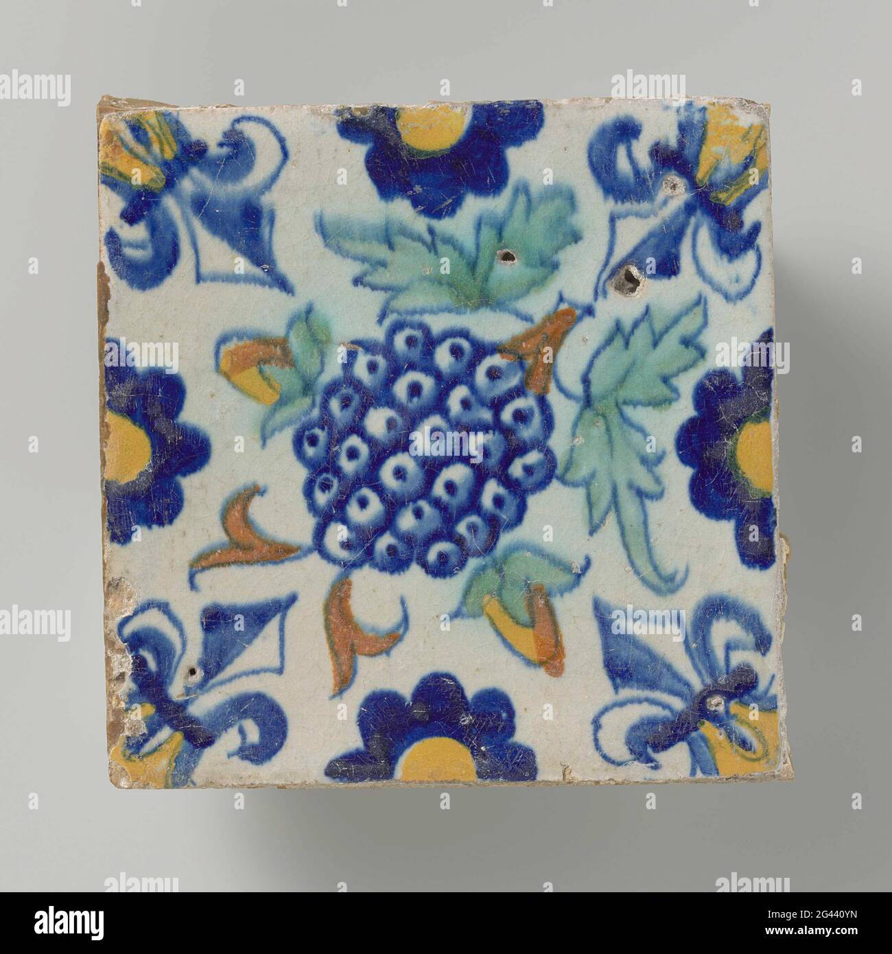 Tile with grape food. Tile with grape food. Part of a field of sixteen ...