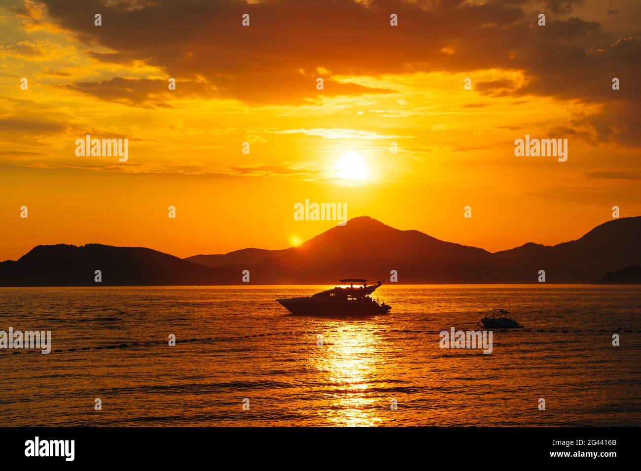 Motor ship sunset sails hi-res stock photography and images - Alamy