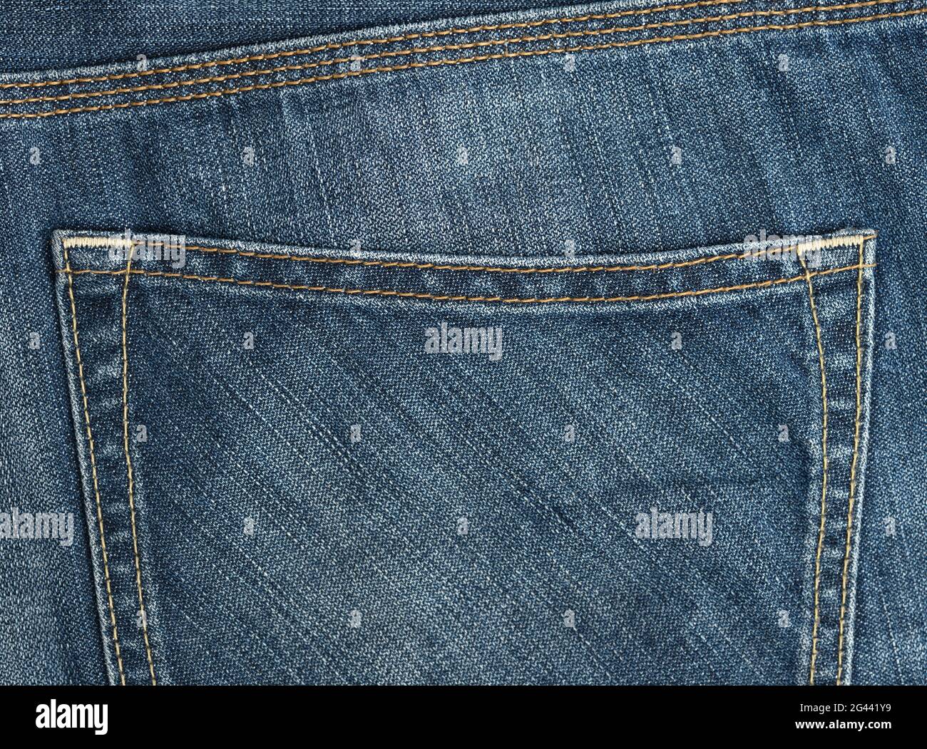 Back pocket of blue jeans, full frame Stock Photo - Alamy