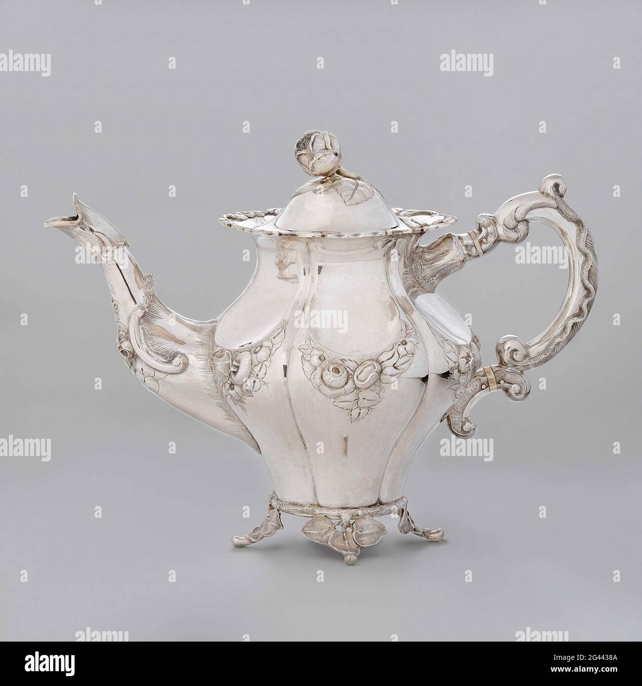 Teapot of silver, sixloby body on four legs in shape of curved branches ...