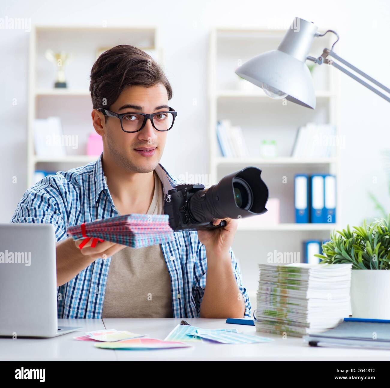 Professional freelance photographer taking photograph hi-res stock ...