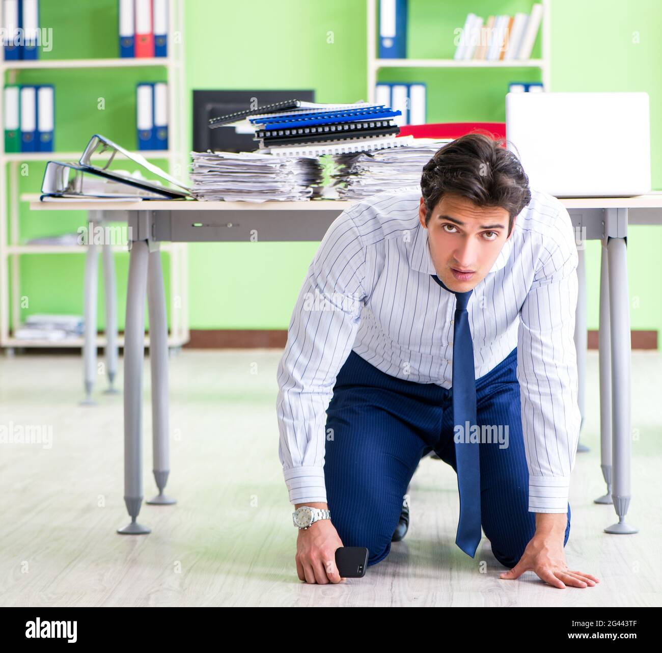 Frustrated businessman stressed from excessive work Stock Photo - Alamy