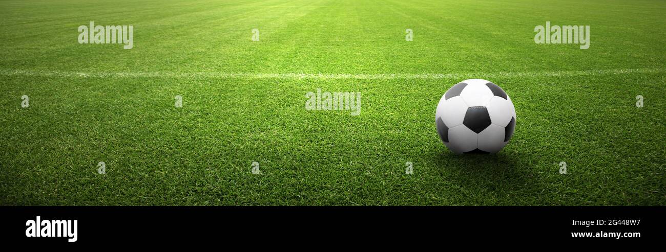 Soccer ball on green playground. Soccer concept Stock Photo - Alamy