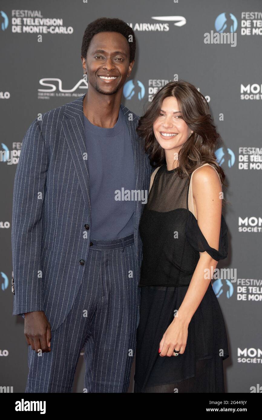 Monte Carlo, Monaco . 18th June, 2021. Edi Gathegi and Adriana Marinescu attend the opening ...