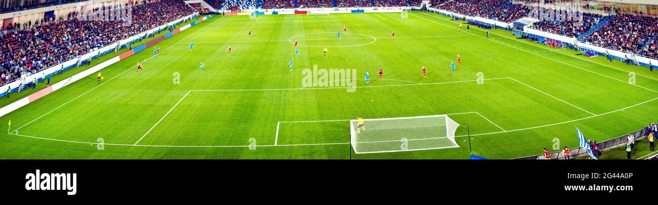 Soccer stadium arena with natural green grass Stock Photo - Alamy