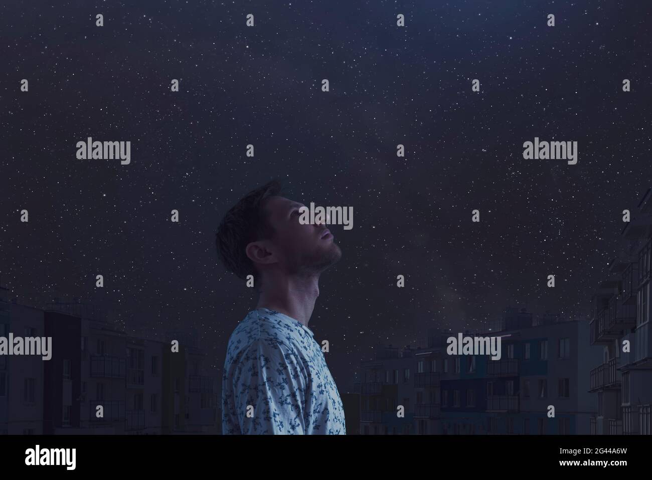 People Looking Up At The Sky At Night
