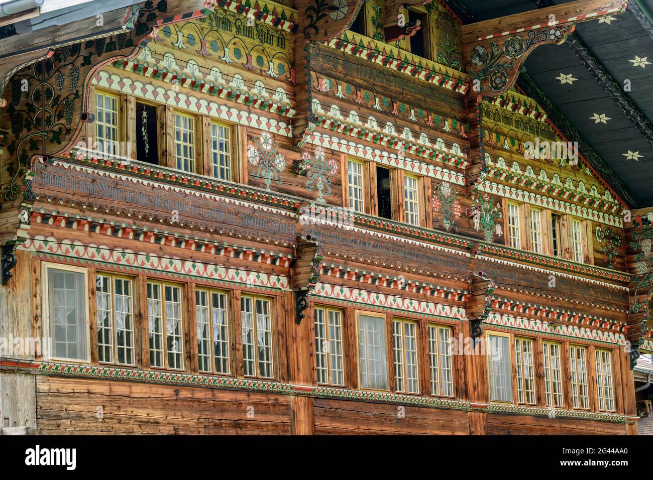 Facade of an old farmhouse with carvings and paintings, Knuttihaus ...