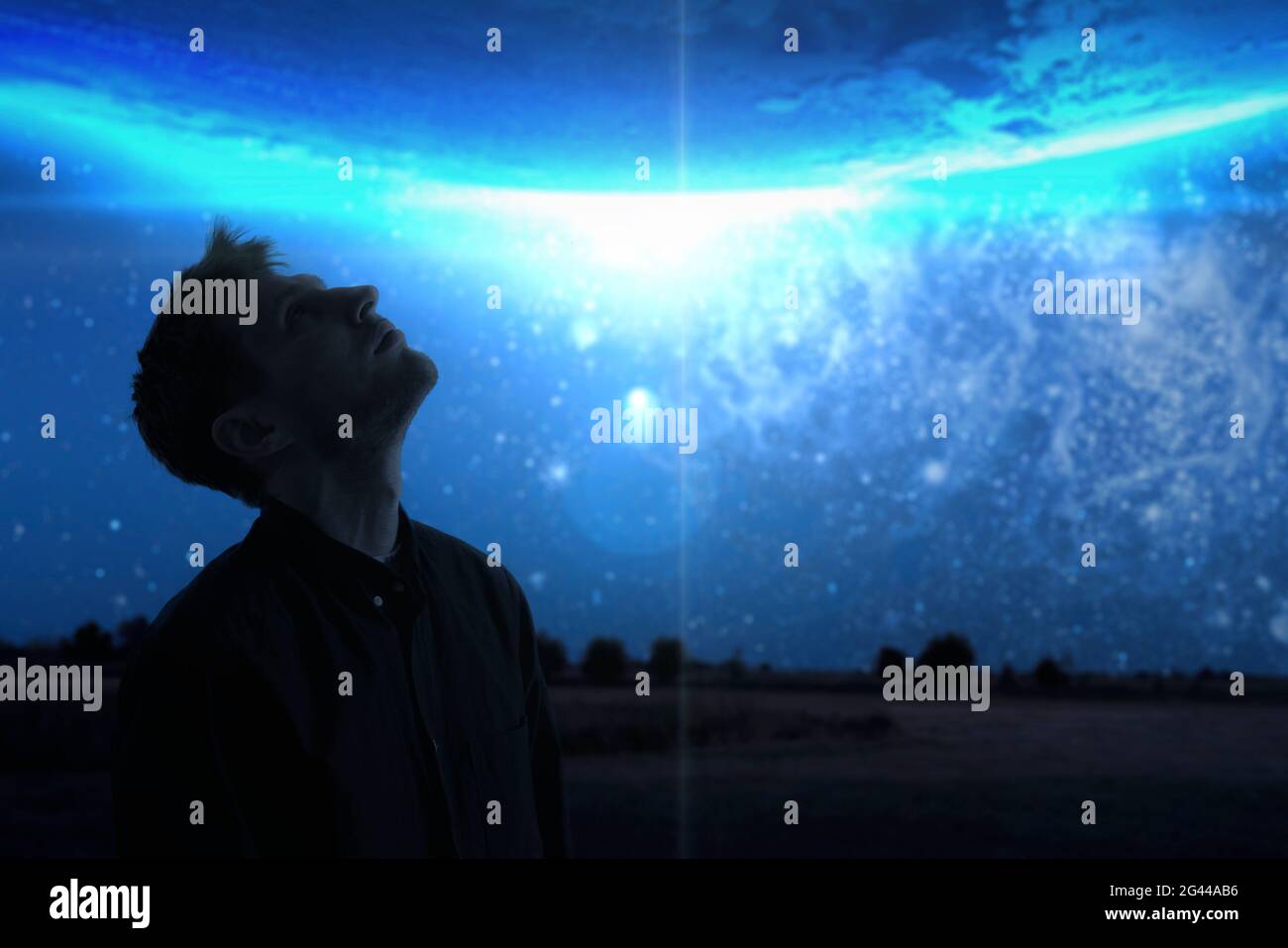 man watching the night sky, looking up, stars of milky way galaxy ...