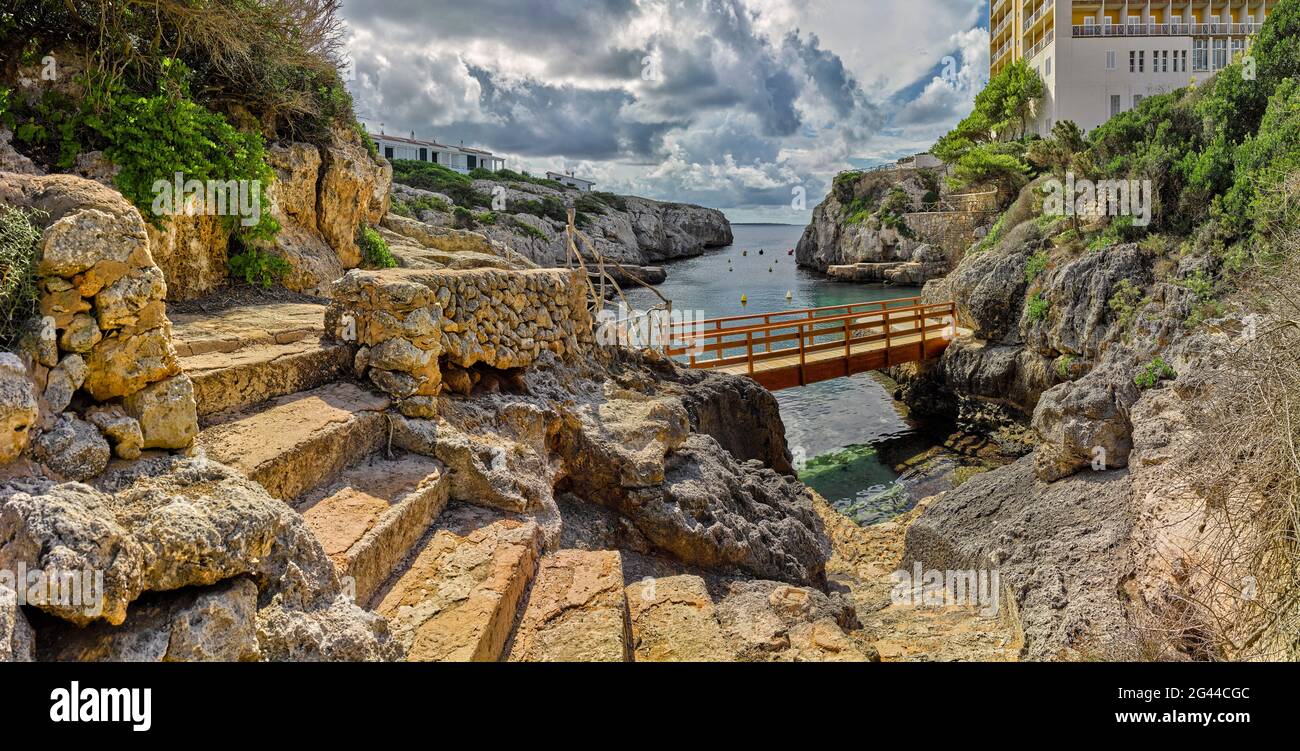 Landscape with small bay, stone steps and rocky coastline, Calan Forcat ...