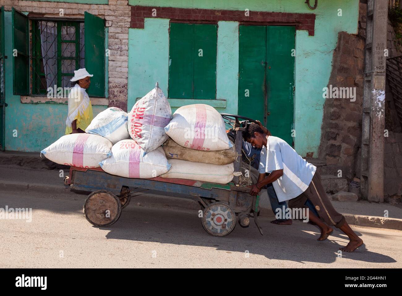 Malagasy people push cart, Madagascar, Africa Stock Photo - Alamy
