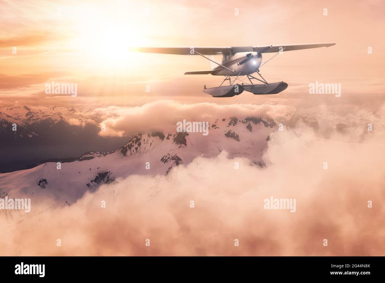 Airplane flying near the Beautiful Canadian Mountain Nature Landscape ...