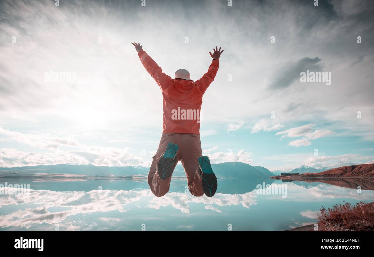 Flying jumping happy positive hi-res stock photography and images - Alamy