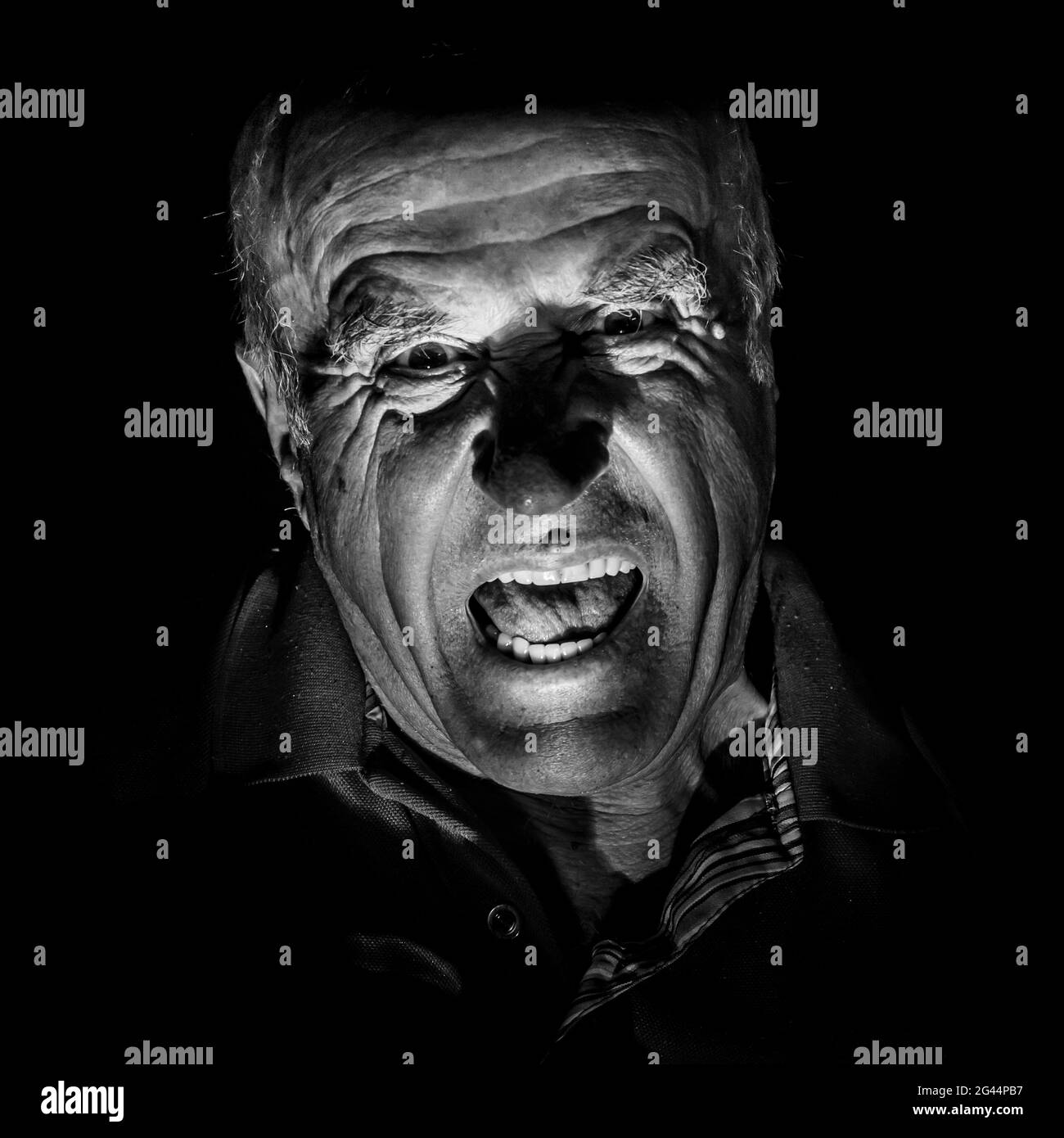 Portrait of old caucasian man who scares watcher. Fear and scare ...