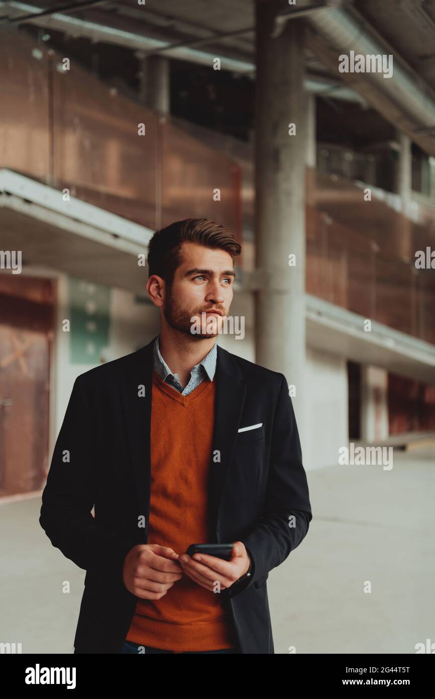 Construction site manager overseeing hi-res stock photography and ...