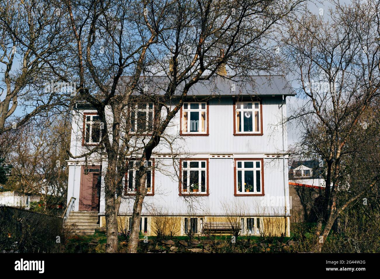 Classic two-story blue house in Reykjavik, the capital of Iceland ...