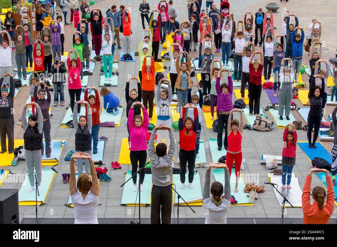 Russia, Vladivostok, 06/18/2016. Yoga trainers present yoga's asana on ...