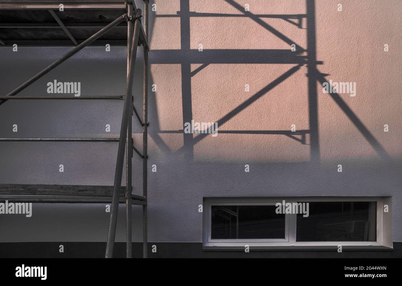 The shadow of the scaffolding Stock Photo - Alamy
