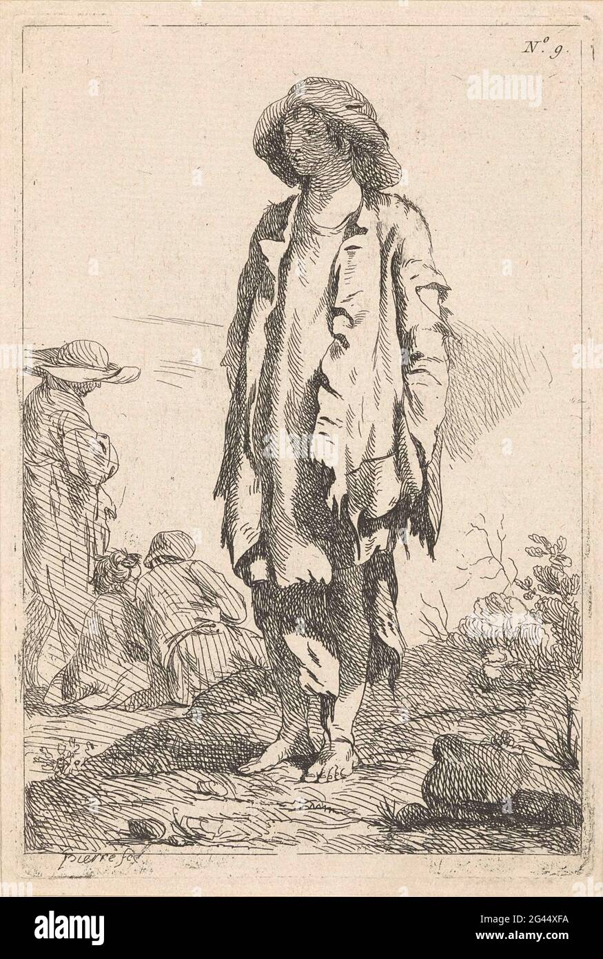 Young standing man dressed in rags; in the background three figures ...