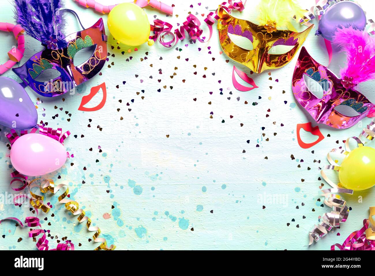 Top view composition with multicolored shiny masquerade masks with ...