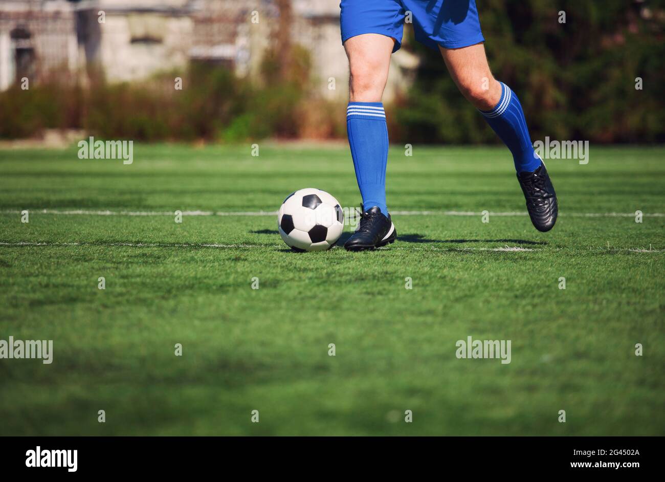 Soccer ball on green playground. Soccer concept Stock Photo - Alamy