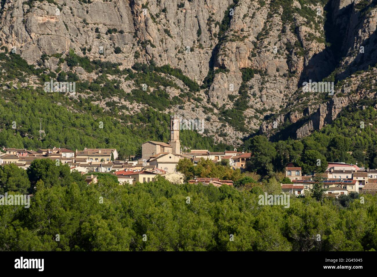 Views of the town of Collbató with the mountain of Montserrat in the ...