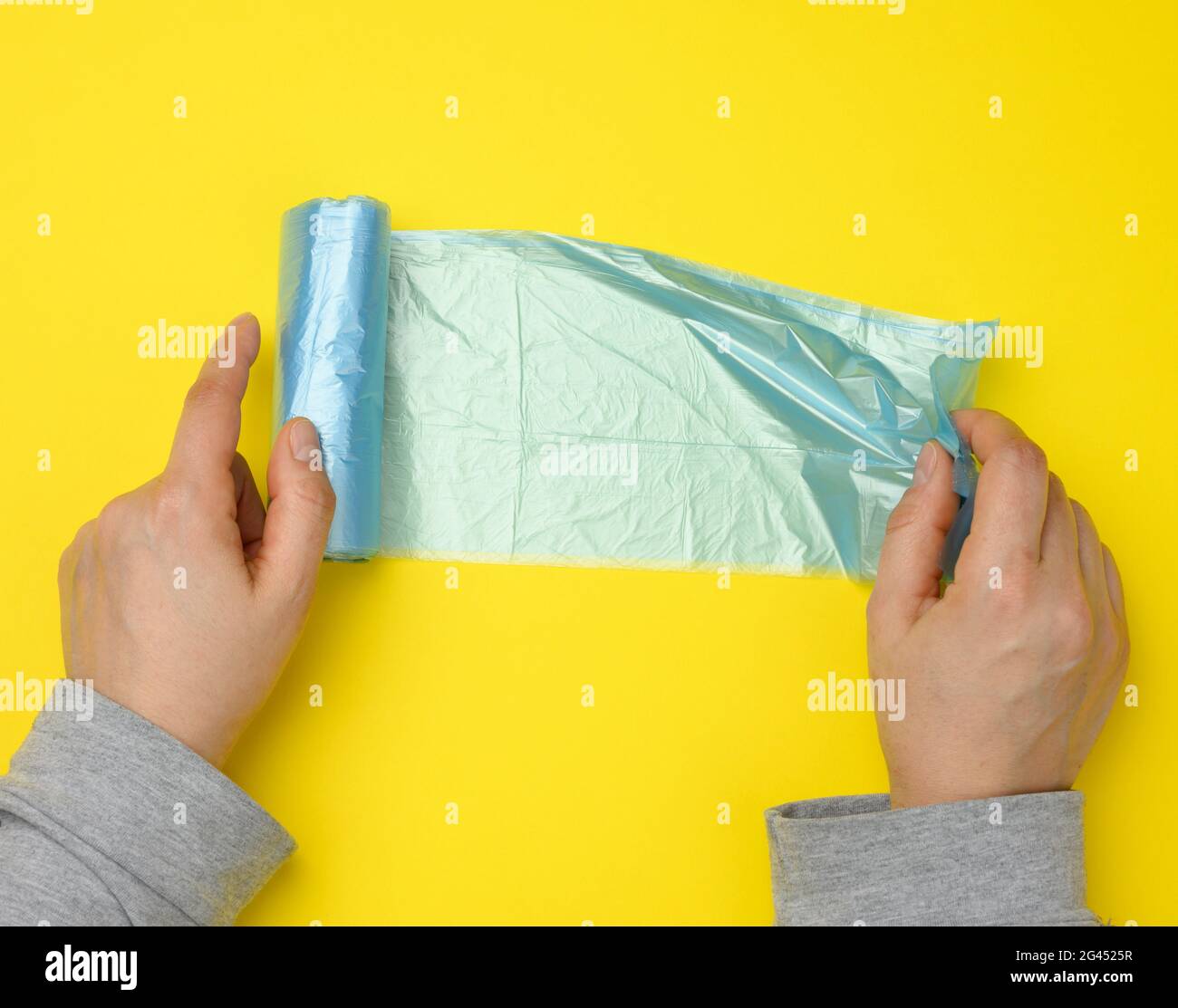 Blue rubbish bag hi-res stock photography and images - Alamy
