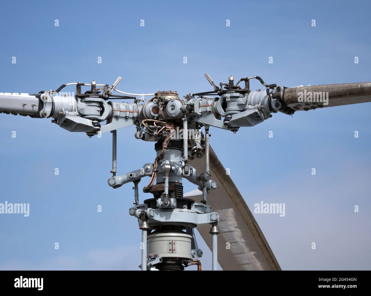 The mechanism of screws military helicopter on the background of blue ...