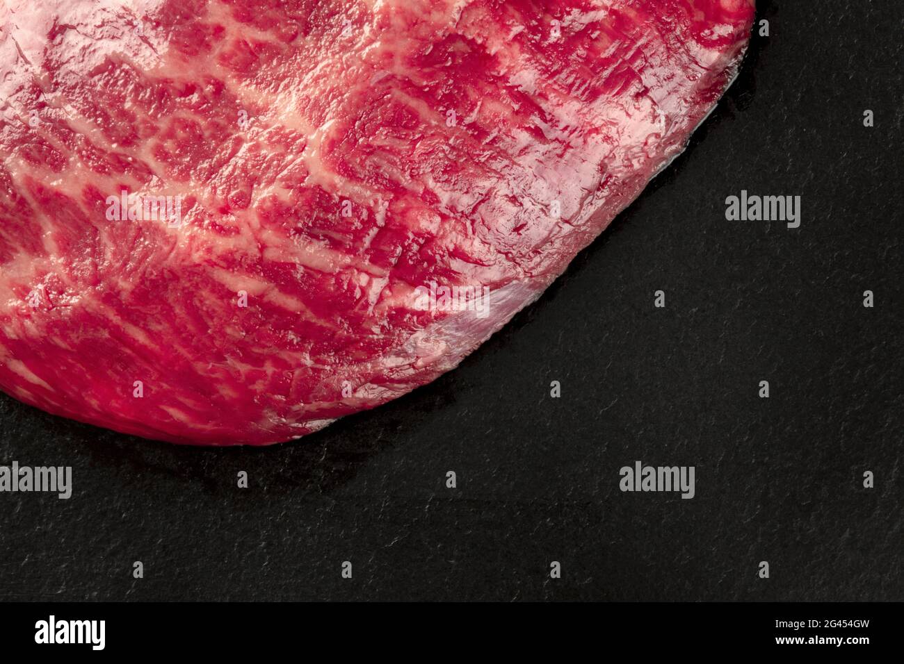 Kobe meat, wagyu beef steak, close-up on black with copy space Stock ...