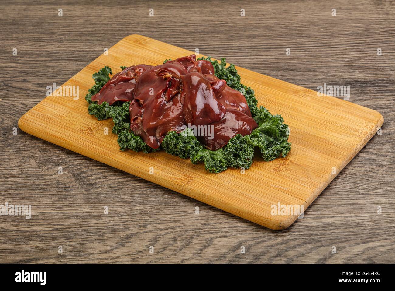 Raw chicken liver over board for cooking Stock Photo - Alamy