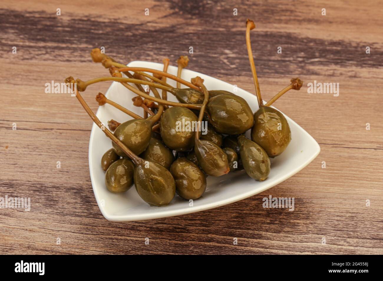 Tasty Caper berries in the bowl Stock Photo - Alamy