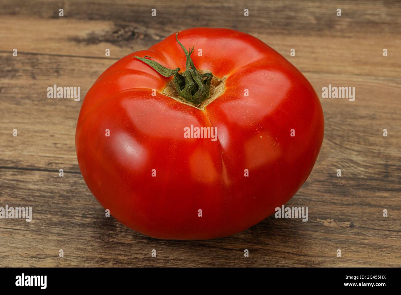 Ripe big juicy red tomato for cooking Stock Photo - Alamy